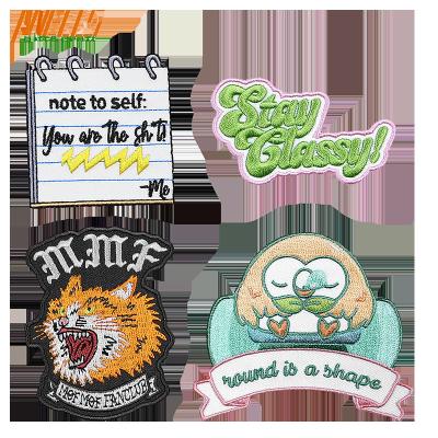 China Custom Size Iron On Embroidery Patch 100pcs Bag Merrowed Border Heat Press Badge for Garment Bag Shirt Jeans for sale