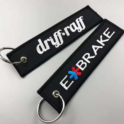 China Custom Embroidered Keychain 130x30mm Cotton Fabric Key Tag for Luggage Bag for sale