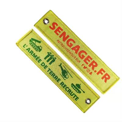China Custom Embroidered Keychain 130x30mm Cotton Fabric Double Sided Jet Tag for sale