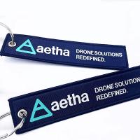 China Custom Embroidered Keychain 130x30mm Cotton Fabric Double Sided Jet Tag for sale