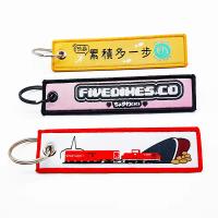 China Custom Embroidered Keychain 130x30mm Cotton Fabric Handmade Anime Motorcycle Key Tag for sale