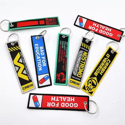 China Custom Embroidered Keychain 130x30mm Cotton Double Sided Key Tag for Aviation Fans for sale