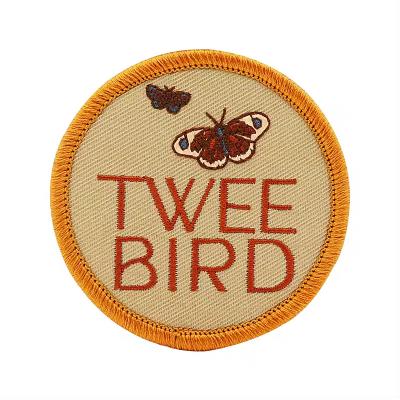 China Customized Embroidered Logo Patches with Merrowed Border Design for sale