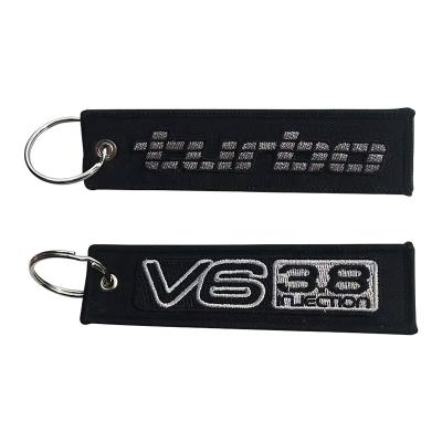 China Custom Embroidered Nylon Keychain 130x30mm Promotional Fabric Key Tag with Logo for sale
