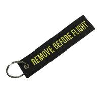 China Custom Remove Before Flight Keychain 130x30mm Red Embroidered Fabric with Key Ring for Aviation Promotions for sale
