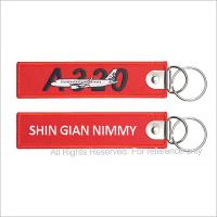 China Custom Embroidered Remove Before Flight Keychain 130x30mm Red Aviation Key Ring for sale