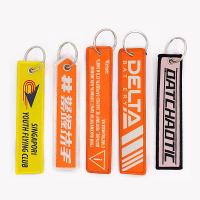 China Customization Personalized Woven Key Tag Shining Charm Soft Metal Keychains for sale