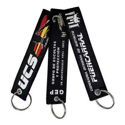China Custom Polyester Woven Keychain 100pcs MOQ Personalized Logo Fabric Key Tag for sale