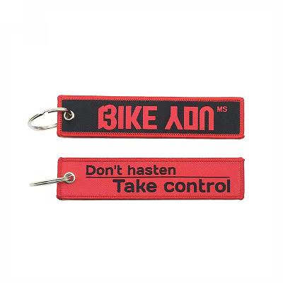 China Custom Woven Keychain Double Sided Logo Polyester Key Ring 100pcs MOQ for sale