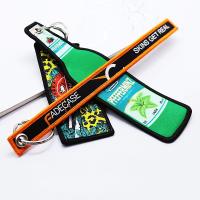 China Customized Double Sided Woven Fabric Embroidery Keychain with Flight Key Ring for sale