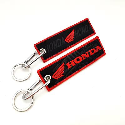 China Custom Woven Keychain Polyester 100000pcs per Month Personalized Logo Key Ring for Luggage Bag for sale