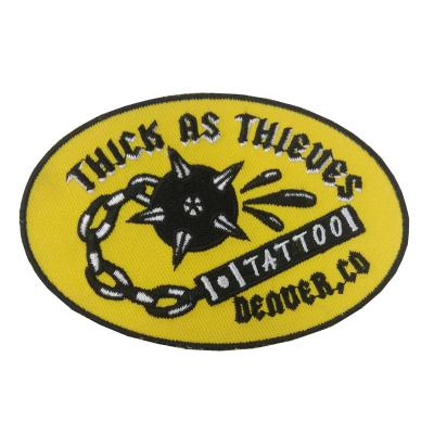China Custom Embroidered School Logo Patches Plastic Backing Sew Iron On 100 Pcs MOQ for sale