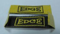 China Custom Heat Laser Cut Woven Patches Iron On Backing 50pcs Low MOQ Dry Cleanable for sale