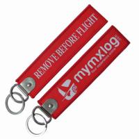 China Custom Polyester Remove Before Flight Keychain 130x30mm with Split Ring and Eyelet for sale