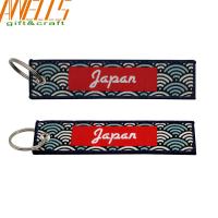 China Custom Woven Keychain Airplane Souvenir Embroidered Key Tag 130x30mm Polyester for sale