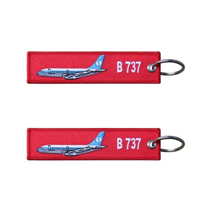 China Custom Embroidery Keychain 130x30mm Remove Before Flight Promotion Gift Merrowed Border for sale