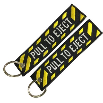 China Custom Polyester Merrowed Border Double Sided Embroidery Keytag 130x30mm for sale