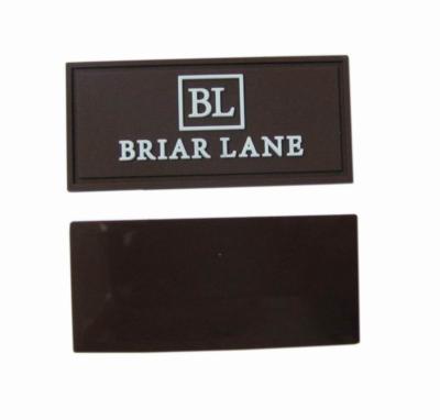 China Custom 2D Embossed Logo PVC Rubber Patch for Garment 100pcs MOQ for sale