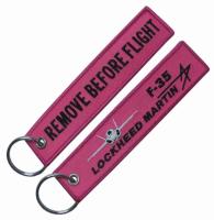 China 75% Embroidery Remove Before Flight Keychain PMS Merrow Broders for sale