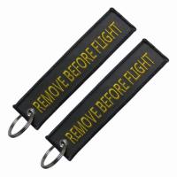 China Custom Embroidered Fabric Keychain 130x30mm Remove Before Flight 75% Embroidery Metallic Thread for sale