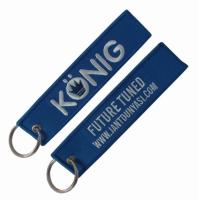 China Custom Remove Before Flight Embroidered Keychain 130x30mm with Eyelet Ring for sale