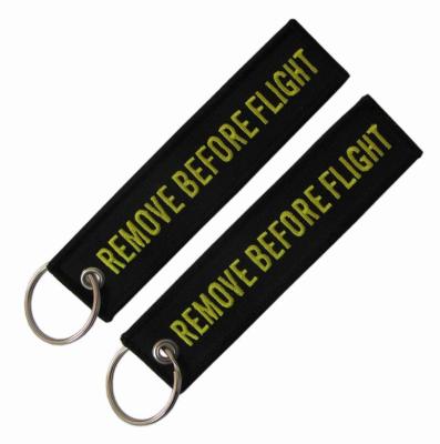 China Custom 75% Embroidery Metallic Thread Remove Before Flight Keychain Twill Patch 100 Pcs MOQ for sale