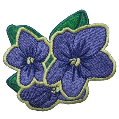 China Custom Embroidered Flower Patch Polyester Background 10C Color Uniform Iron On Patch Heat Cut Border for sale