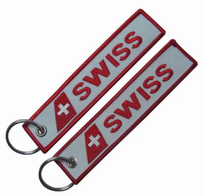 China Custom Embroidered Key Tags 130x30mm Merrowed Border PMS Color Aviation Keychain for sale