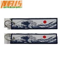 China Custom PMS 130x30mm Woven Keychain Fabric Jet Tags with Merrowed Border for Promotional Gifts for sale