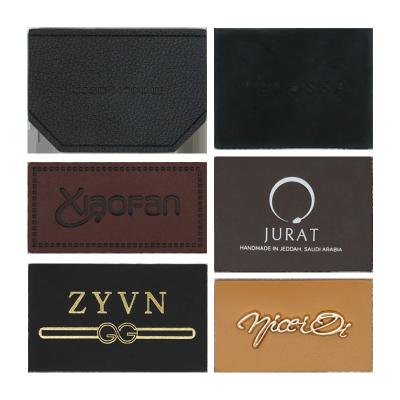 China Custom Faux Leather Labels PMS Color Vegan Merrow Border for Clothing Handbag Tagger 100 PCS for sale