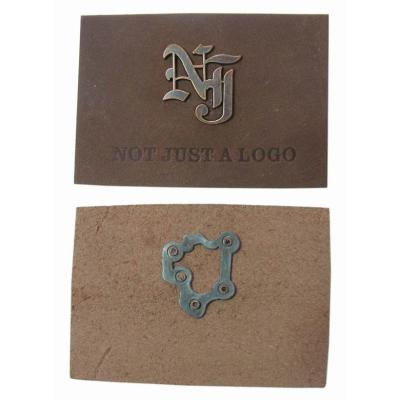 China Custom Embossed Leather Patch Label for Jeans Hot Stamped Velcro Sew On 50pcs MOQ for sale