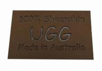 China Custom Twill Embossed Leather Labels Merrow Border Washable for Clothing Jeans 100pcs MOQ for sale
