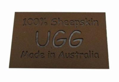 China Custom Twill Embossed Leather Labels Merrow Border Washable for Clothing Jeans 100pcs MOQ for sale