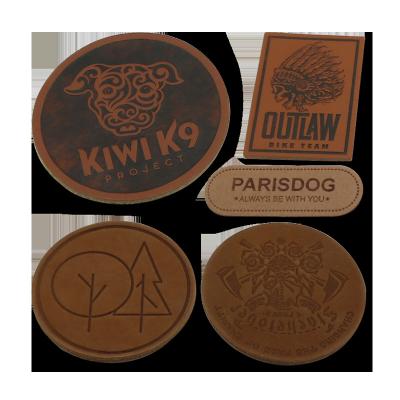 China Custom PU Leather Label Tags Debossed Hot Stamping Felt Backing for Hats 0.5-2mm for sale