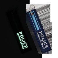 China Twill Material Custom Embroidered Keychain Glow In Dark Merrowed Border PMS for sale