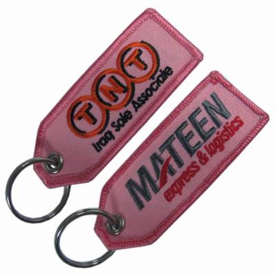 China Custom Embroidered Keychain 130x30mm Merrow Border Twill Felt Hang Tag for Luggage Clothing for sale
