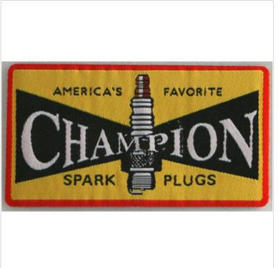 China Champion Polyester Woven Patches Paper Coating Merrowed Border for sale