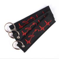 China Custom Embroidery Logo Patch Keychain 130x30mm Twill Fabric Skin Friendly for sale