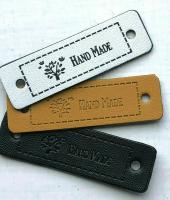 China Custom PU Leather Garment Labels with Velcro Backing Shrink Proof 100pcs MOQ for sale
