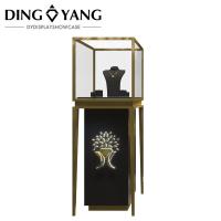 China Brush Golden Stainless Steel Custom Jewelry Showcase Match Black Wooden Storage With Lighting for sale