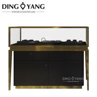 China Brush Golden Stainless Steel Custom Jewelry Showcase Match Black Wooden Storage With Lighting for sale