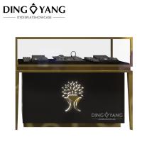 China Brush Golden Stainless Steel Custom Jewelry Showcase Match Black Wooden Storage With Lighting for sale