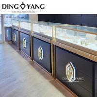 China Custom Made Fashion Black Golden Jewelry Counter , Jewelry Counter Furniture With Low Power Consumption Lights Systems for sale
