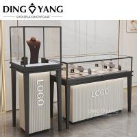 China Custom Made Fashion Black White Jewelry Counters Beauty Design Style Durable Sophisticated Enclosed Storage Area for sale
