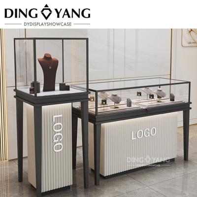 China Custom Made Fashion Black White Jewelry Counters Beauty Design Style Durable Sophisticated Enclosed Storage Area for sale