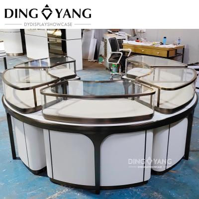 China Modern Golden Glass Stainless Steel Luxury Round Jewelry Showcase Combination Of Practicality And Beauty for sale