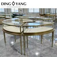 China Modern Golden Glass Stainless Steel Luxury Round Jewelry Showcase Combination Of Practicality And Beauty for sale