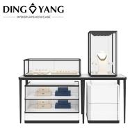 China Modern Glass Stainless Steel Fashionable Jewelry Showcase With Led Light for sale