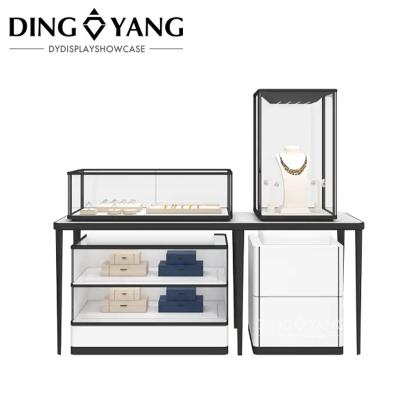 China Modern Glass Stainless Steel Fashionable Jewelry Showcase With Led Light for sale