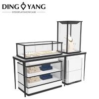 China Modern Glass Stainless Steel Fashionable Jewelry Showcase With Led Light for sale